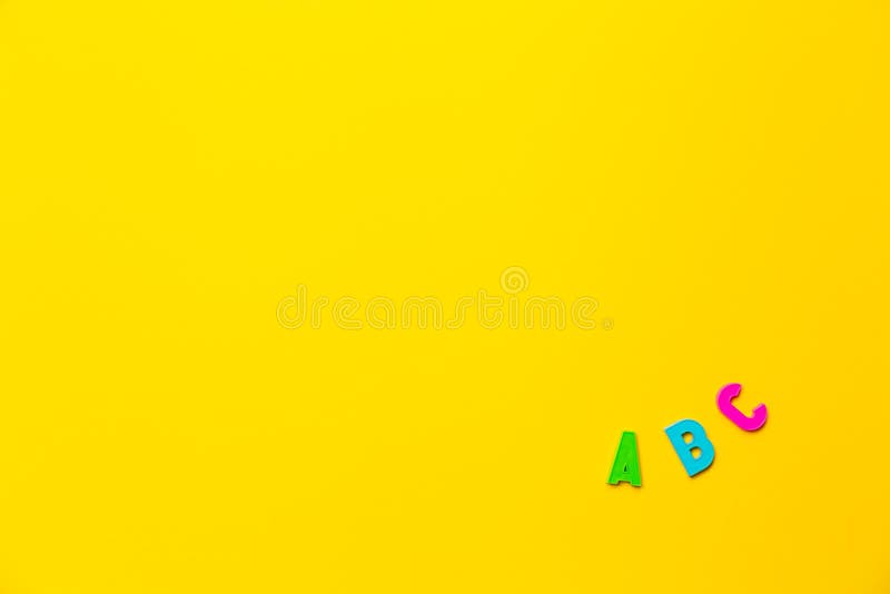 Multicolored Letters a, B, C of the Alphabet on Yellow Background ...