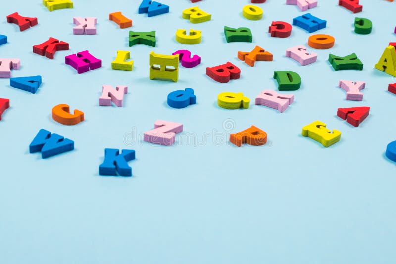 Multicolored Letters on a Blue Background Stock Photo - Image of school ...