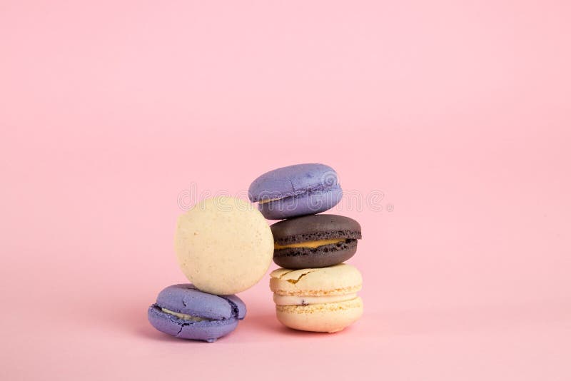 Multicolored Macaroni Cookies on Pink Isolated Background Stock Photo ...