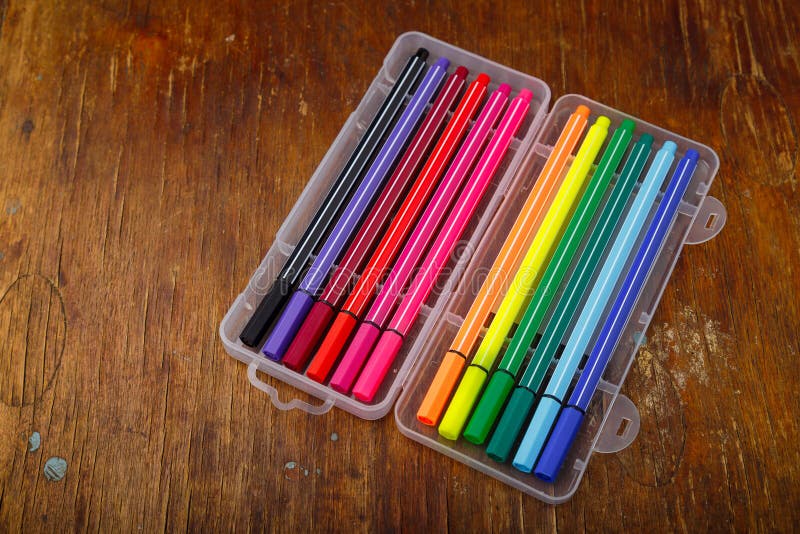 Multicolored Marker or Fine Liner Pens in Plastic Case on Wooden Table ...