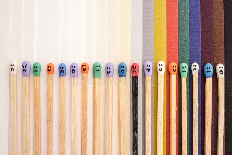 Multicolored Matchsticks with Head Faces on Multicolored Paper Stock ...