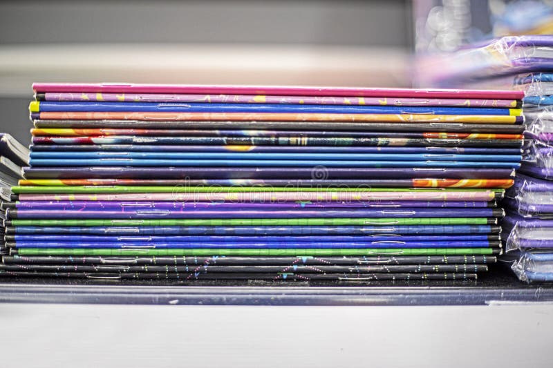 Multicolored Notebooks Stacked on Top of Each Other in Columns ...