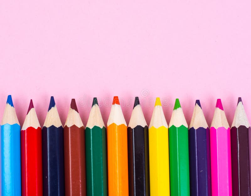 Multicolored Pencils on Pink Paper Background Stock Photo - Image of ...