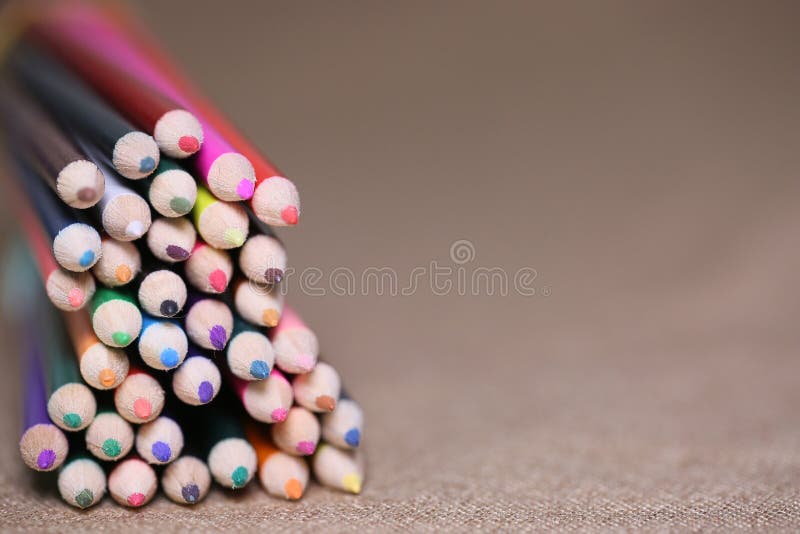 Multicolored Pencils on the Table. a Stack of Colored Pencils Ti Stock ...