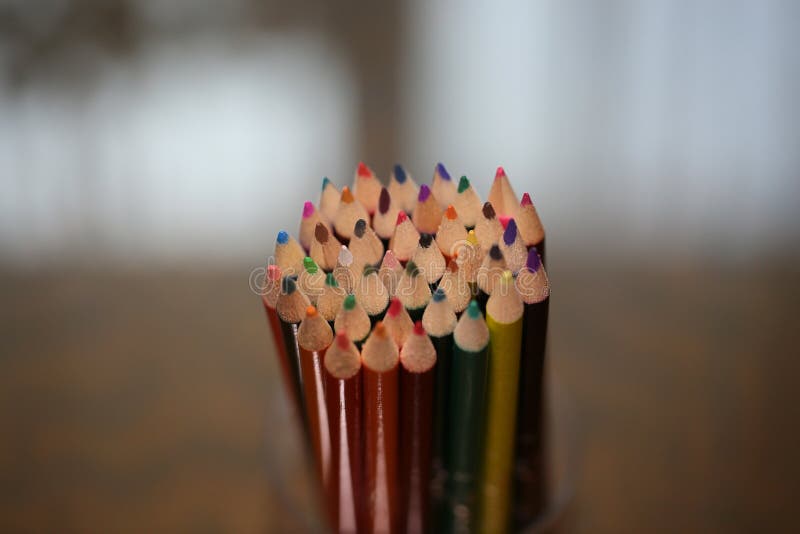 Multicolored Pencils on the Table. a Stack of Colored Pencils Ti Stock ...
