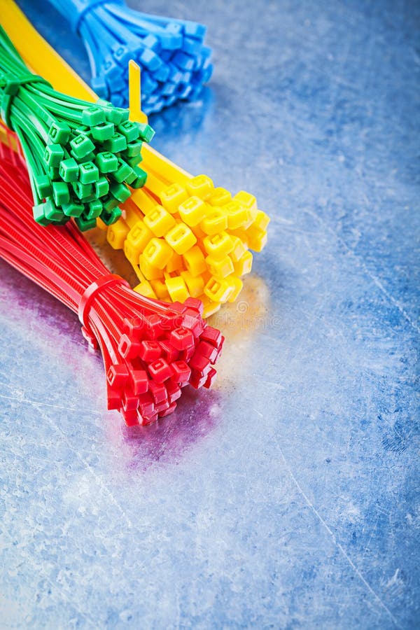 Multicolored Plastic Self-locking Tying Cables on Metallic Backg Stock ...
