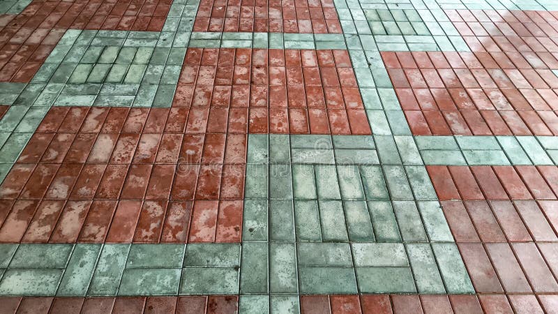 Multicolored Red and Gray Tiles on the Floor in Rows and Patterns ...