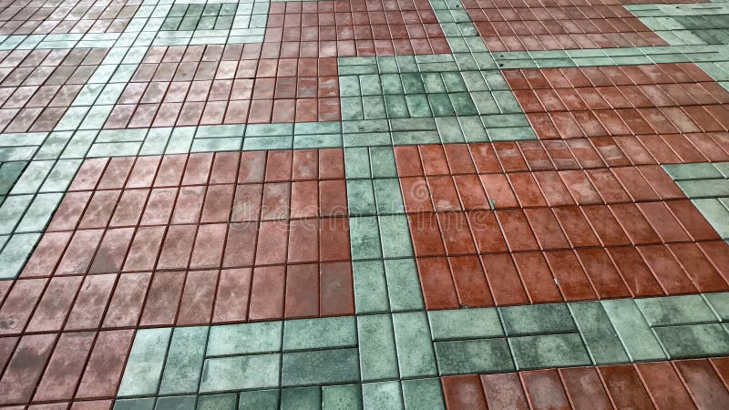 Multicolored Red and Gray Tiles on the Floor in Rows and Patterns ...