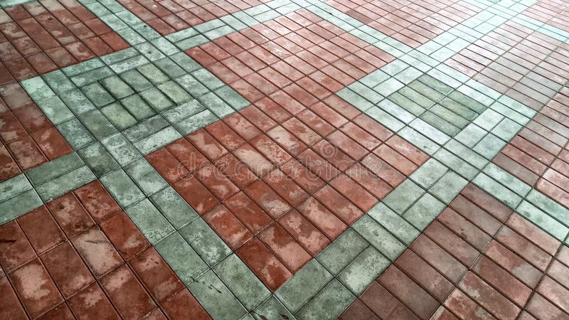 Multicolored Red and Gray Tiles on the Floor in Rows and Patterns ...