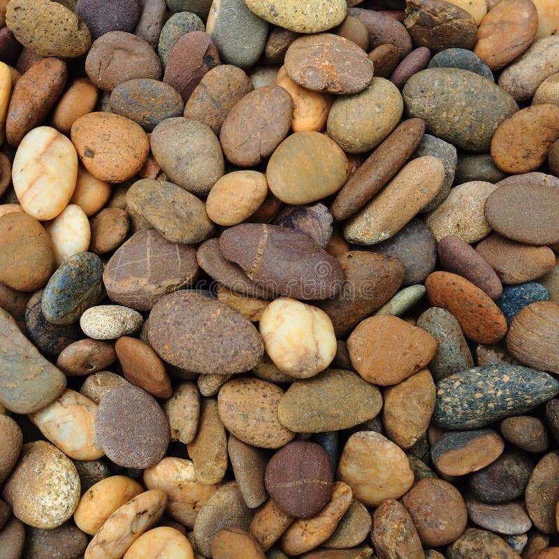 Multicolored river pebbles stock image. Image of beach - 154058589