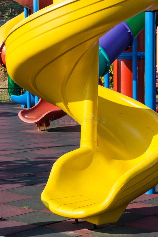 Multicolored Round Slides with Yellow One in Foreground. Stock Photo ...