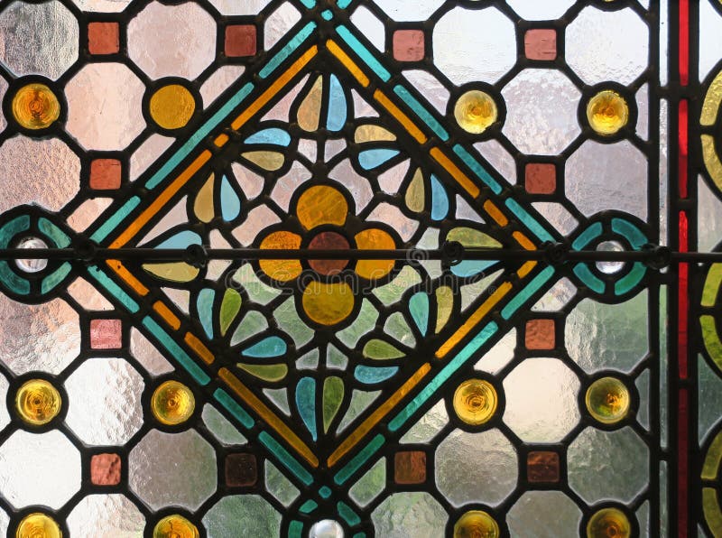 Multicolored Stained Glass Window with a Flower Pattern in a Square ...