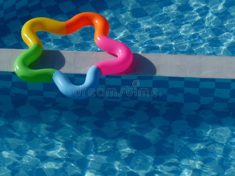 Multicolored Star Shaped Inflatable Floating on Pool Stock Image ...