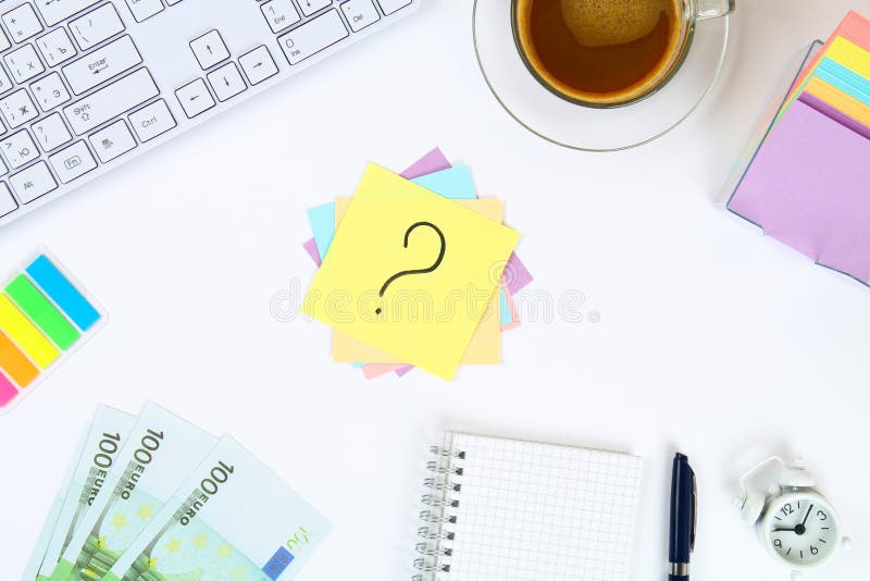 Multicolored Stickers Note with Question Mark on White Desktop Next To ...