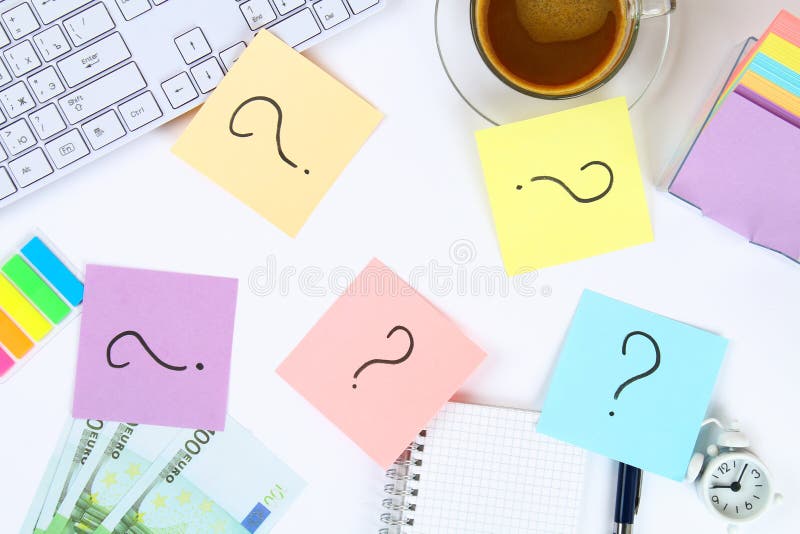 Multicolored Stickers Note with Question Mark on White Desktop Next To ...