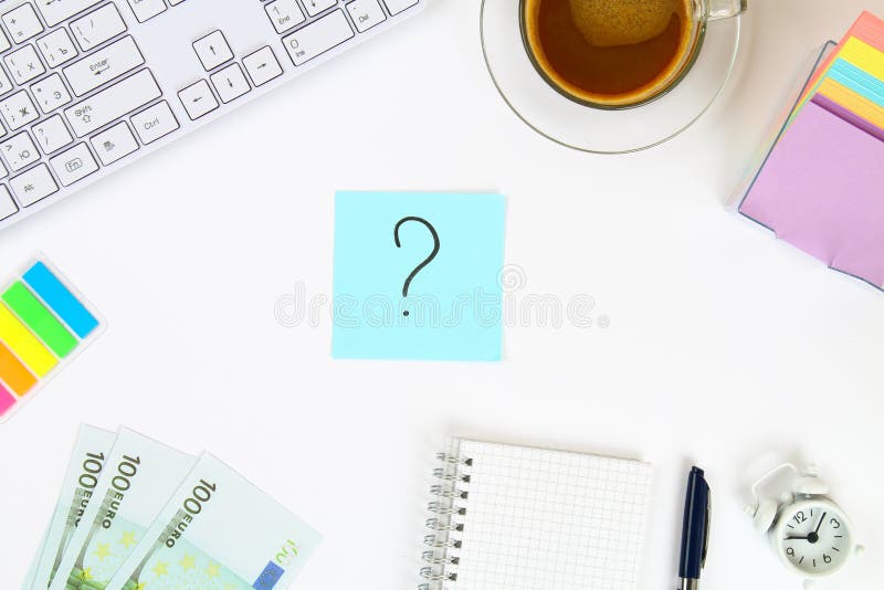Multicolored Stickers Note with Question Mark on White Desktop Next To ...