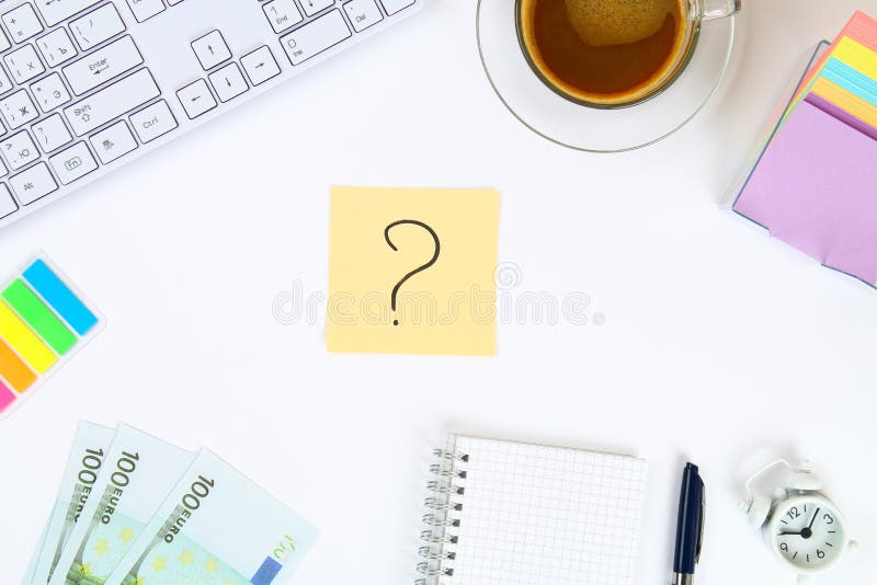 Multicolored Stickers Note with Question Mark on White Desktop Next To ...