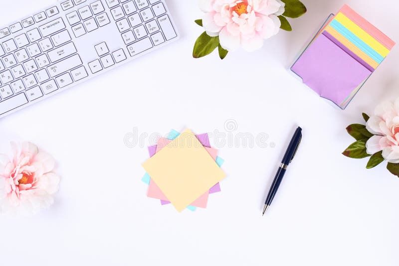Multicolored Sticky Note Stickers on a White Desktop Next To a Coffee ...