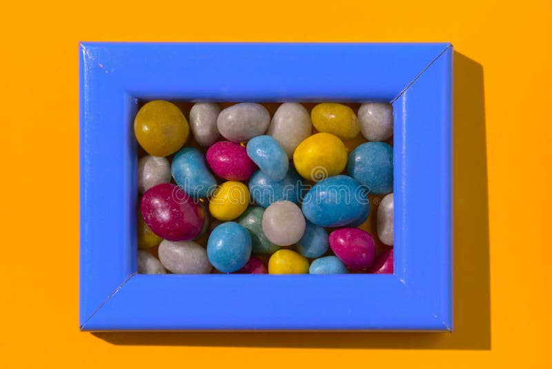 Multicolored Stones Candy Dragees in a Frame. Concept Design. Stock ...