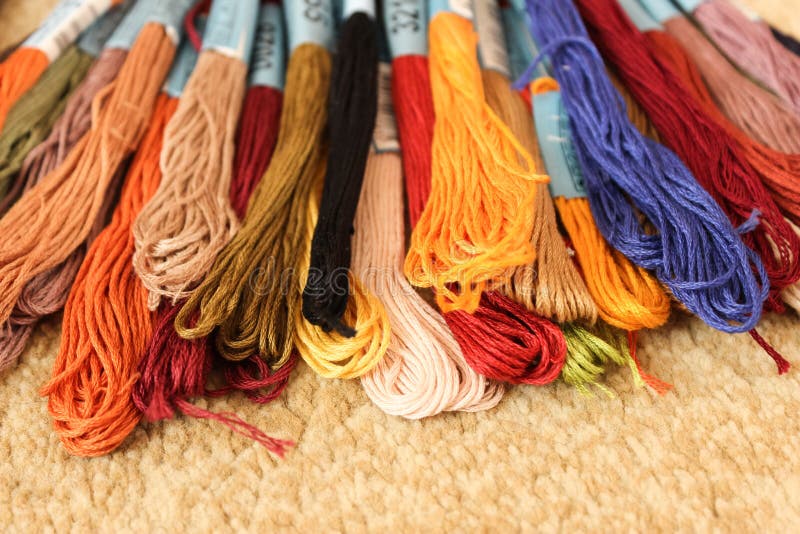 Multi-colored thread floss stock photo. Image of green - 64014378