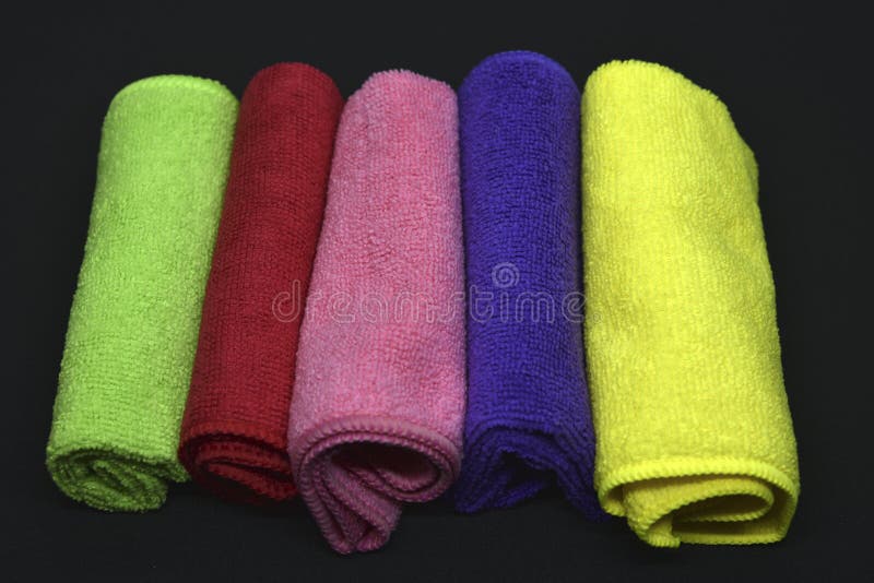 Multicolored Towels on a Black Background. Terry Towels. Colored Rags ...