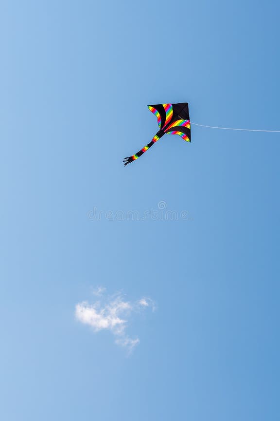 Multicoloured One-string Stunt Kite Against Sky. Delta-shape Kite Stock ...