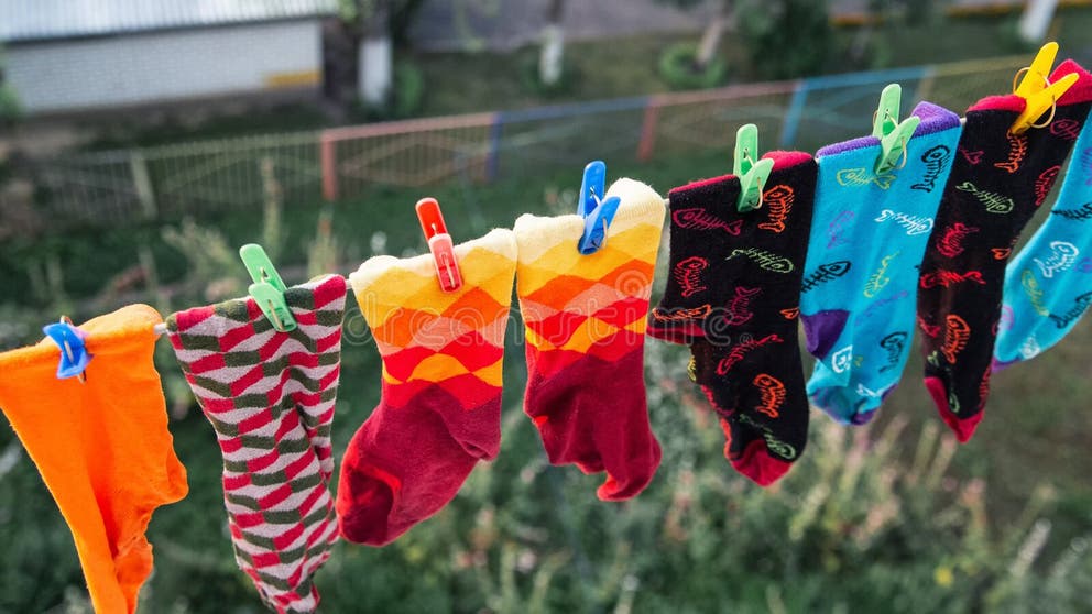 Multicoloured Socks are Dried on a String Stock Image - Image of ...