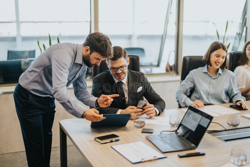 Multicultural Business People Collaborating in Modern Office Setting ...