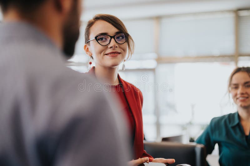 Multicultural Business People Engaging in a Lively Team Discussion ...