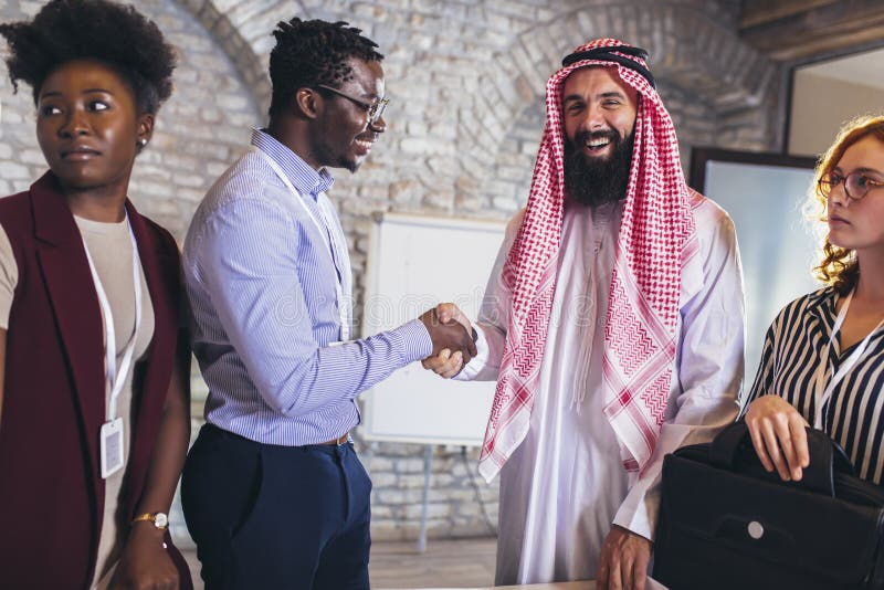 Multicultural Business People Meeting and Talking about Business. Stock ...