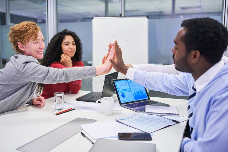 Multicultural Business Startup Team at the High Five Stock Photo ...