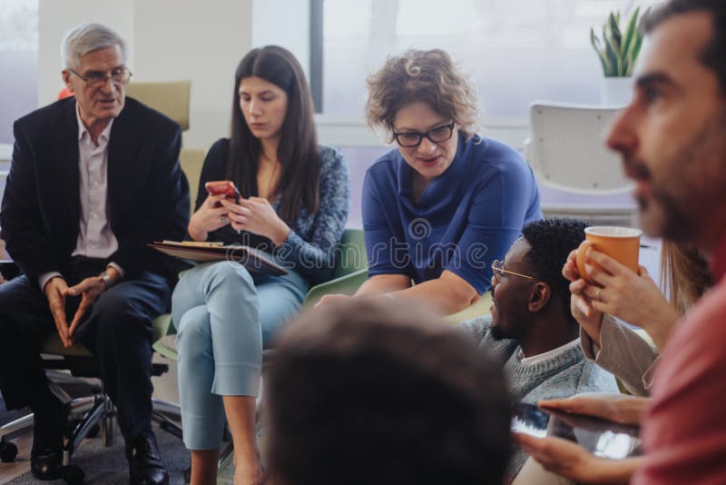Diverse Business Team Brainstorming in a Modern Co-working Space ...