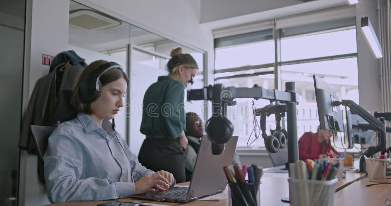 Multicultural Business Team Collaborates in a Modern Office Environment ...