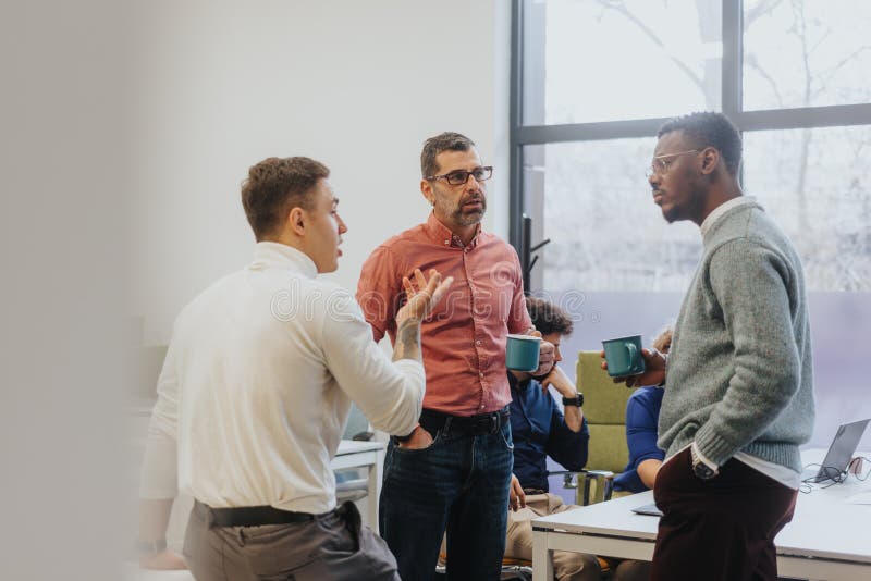 Multicultural Business Team Collaborating in Productive Corporate ...