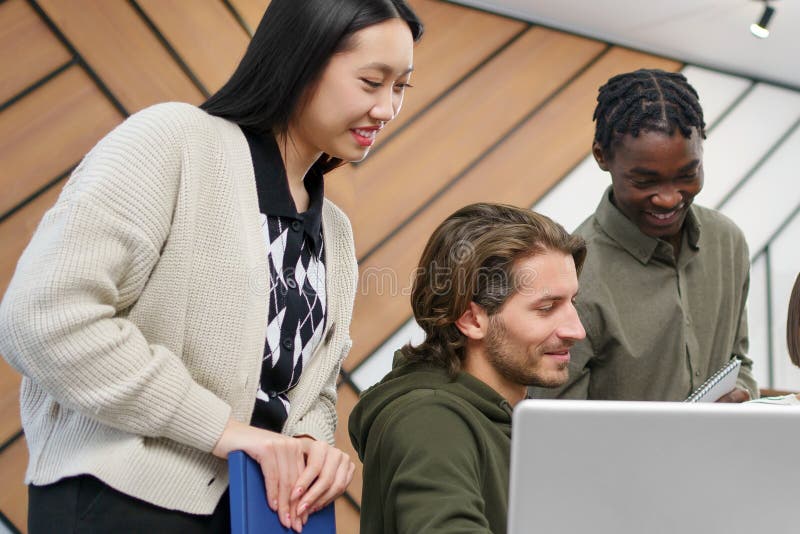 Multicultural Business Team Discussing Current Tasks for a New Project ...