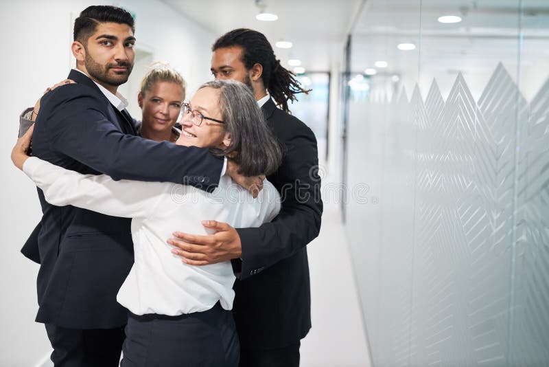 Multicultural Business Team Hugging in a Circle Stock Image - Image of ...