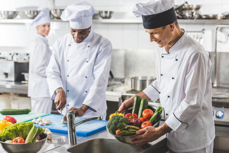 Multicultural Chefs Preparing Stock Photo - Image of caucasian, adults ...