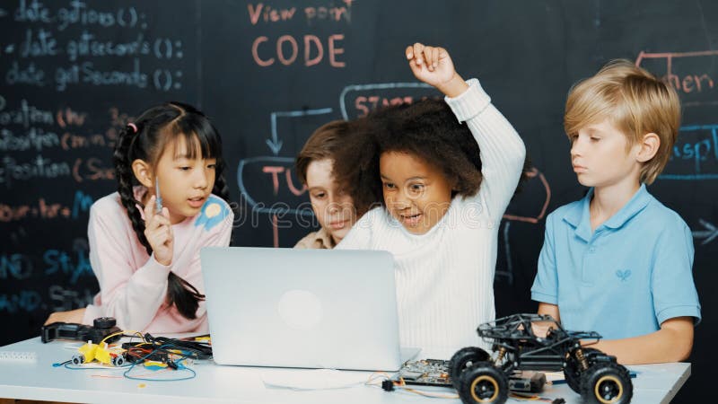 Multicultural Children Using Laptop Programing Engineering Code. Erudition. Stock Image - Image ...
