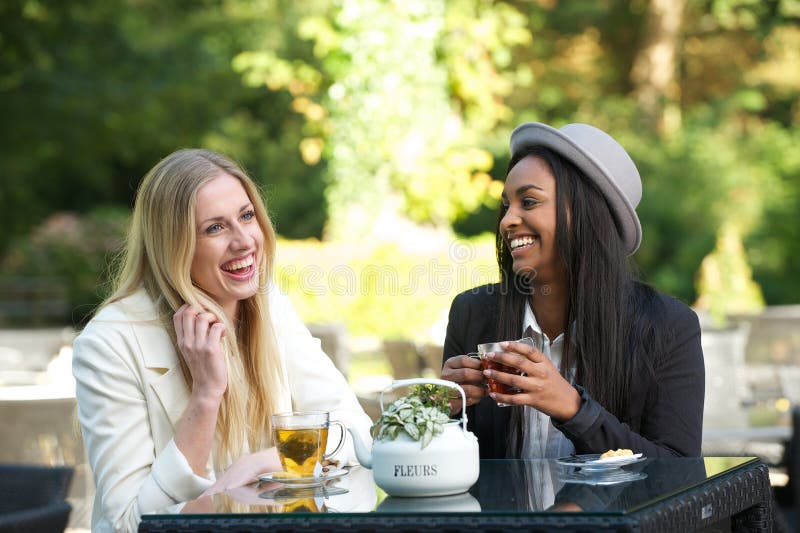 Multicultural Friends Laughing and Drinking Tea Stock Image - Image of ...
