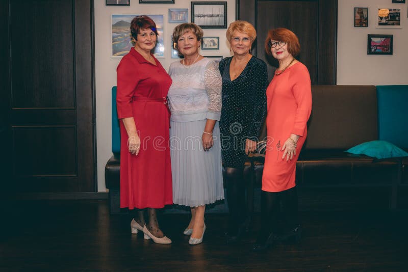 Multicultural Group of Female Friends Smiling and Interacting Indoors ...