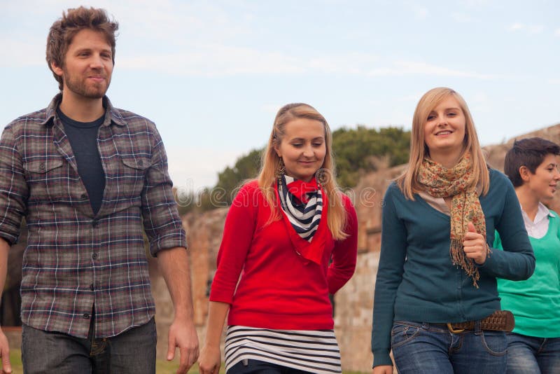 Multicultural Group of People Walking Together Stock Image - Image of ...