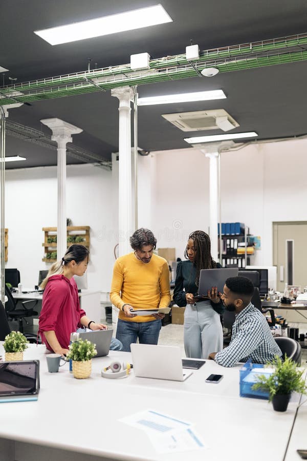 Multicultural Office Workers Talking Stock Photo - Image of colleagues ...