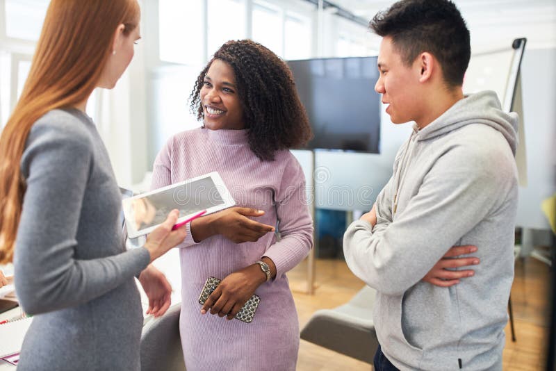Multicultural Start-up Team in Discussion Stock Photo - Image of ...