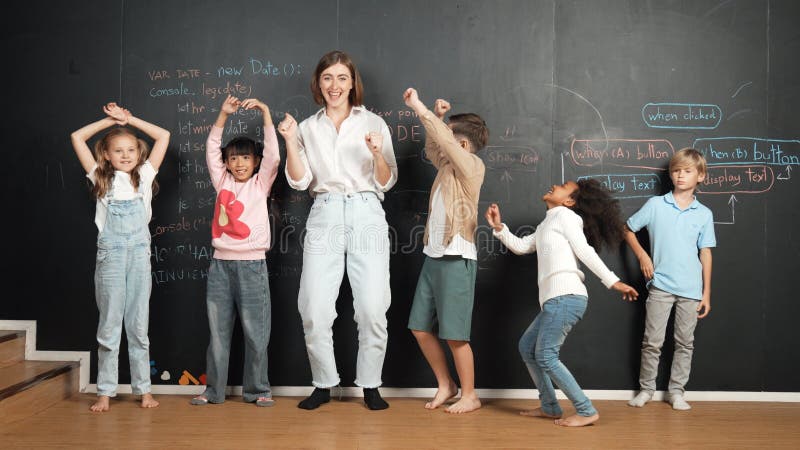 Multicultural Student and Teacher Smiling and Standing at Blackboard ...