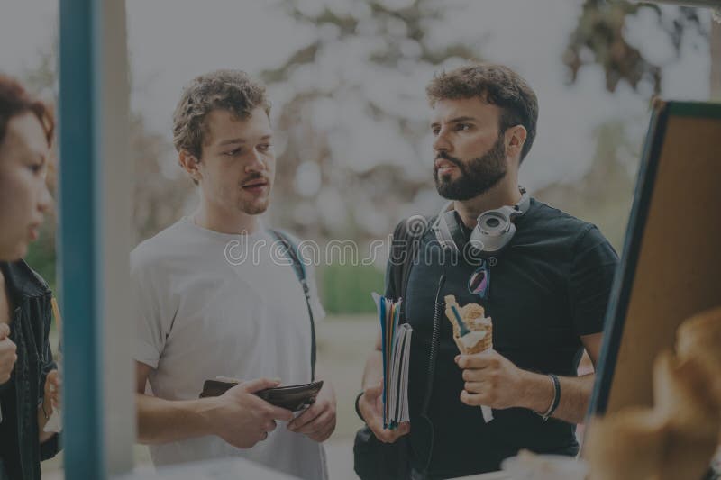 Multicultural Students Enjoying a Break with Ice Cream in the Park ...