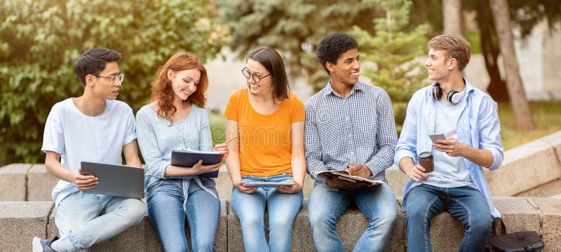 Multicultural Students Learning Together Working on Group Project ...