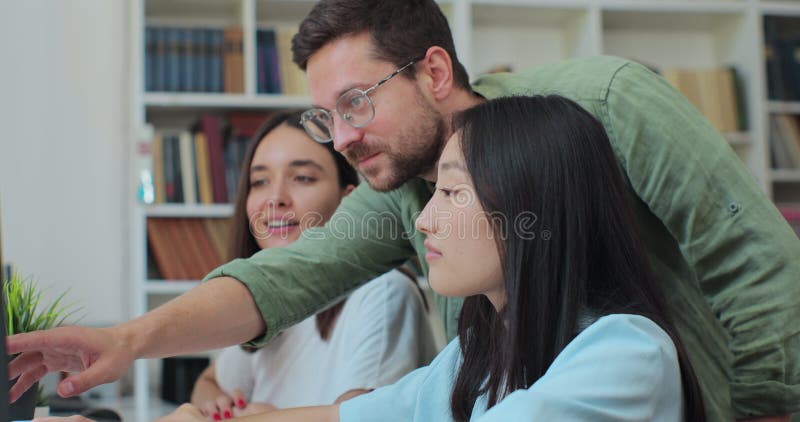 Multicultural Students Study for Exams As a Team, Use Computer, Talk ...