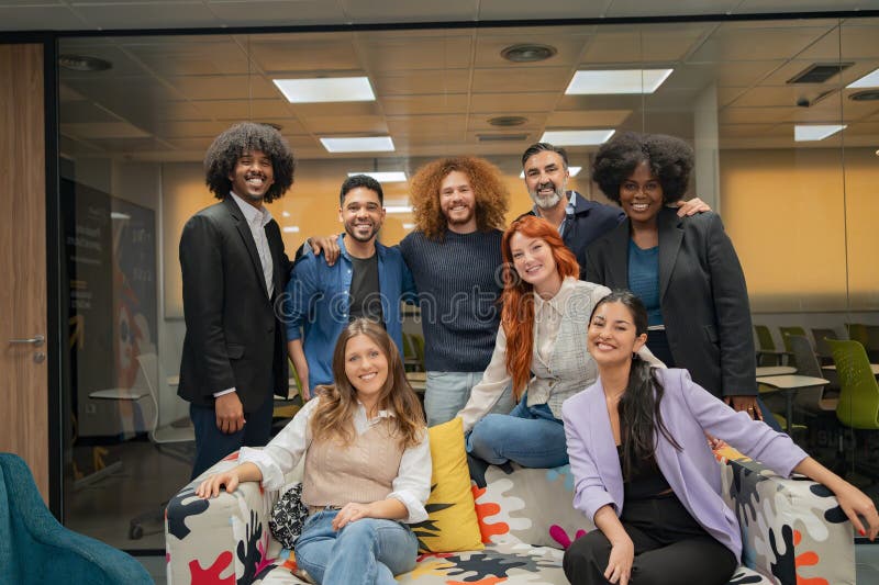 Multicultural Team Posing Cheerfully in an Office. Stock Image - Image ...