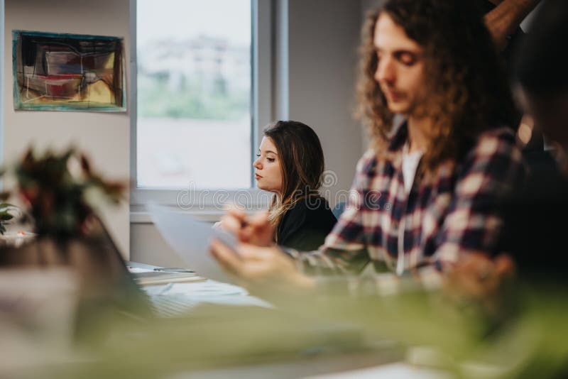 Multicultural Team Working Together in a Startup Office Environment ...