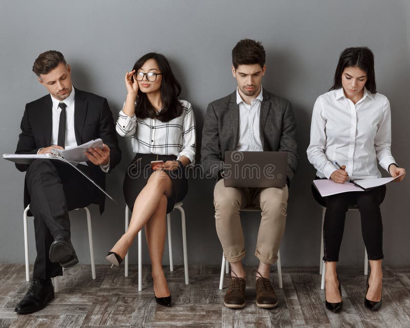 Multiethnic Business People with Digital Devices and Folders Waiting ...